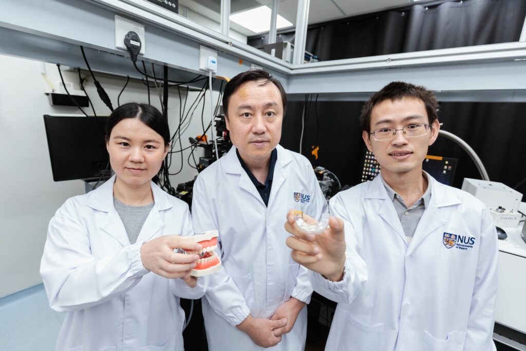 NUS researchers invented first-ever interactive mouthguard that controls electronic devices by ...